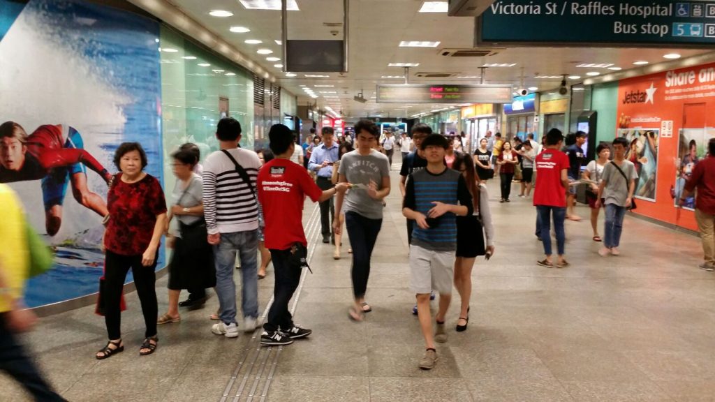 6 Tips to Distribute Booklets in the MRT to Capture Commuters' Attention
